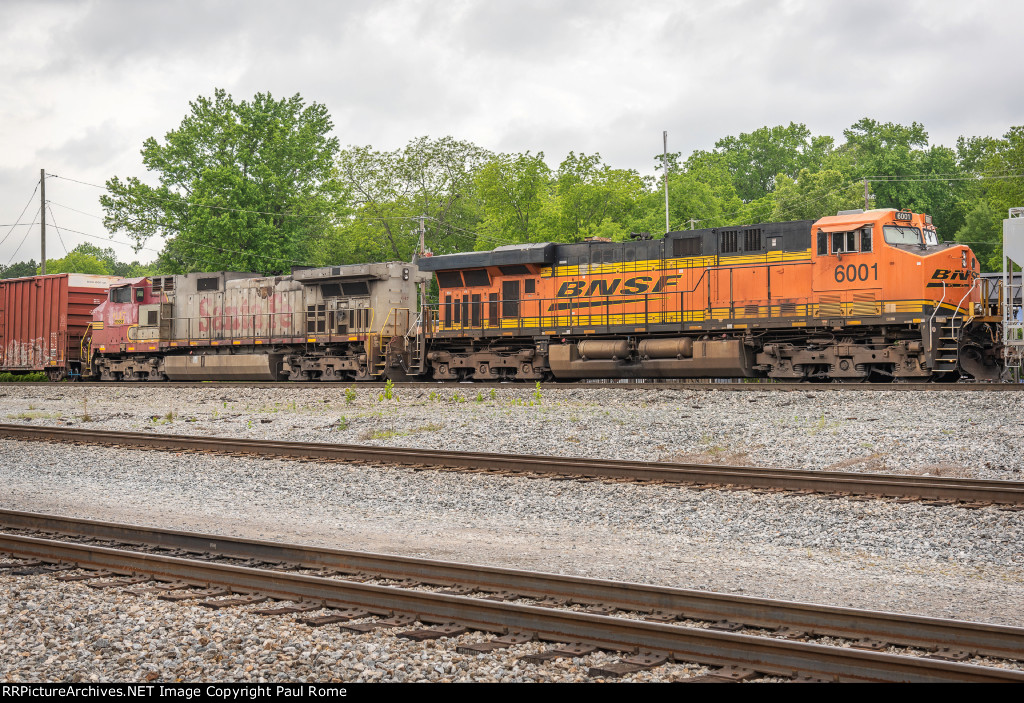 BNSF 6001. BNSF 647, mid-train DPU unit on NS train Westbound at NS Norris Yard